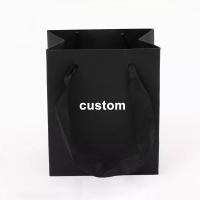 China Waterproof Oilproof Clothing Paper Bags Supermarket Black Paper Shopping Bags for sale