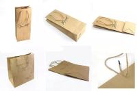 China OEM 20x25x10cm Personalized Paper Garment Bags With Satin Ribbon for sale