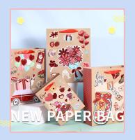 China Ribbon Handle Christmas Kraft Paper Bags Decorating Paper Bag For Valentine'S Day for sale