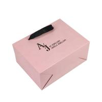 China Glossy Lamination Shoes Clothing Paper Bags 250gam Coated Pink Kraft Bags for sale