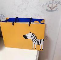 China FSC ISO9001 Yellow Clothing Paper Bags Zebra Print Duplex Board Paper Bag for sale