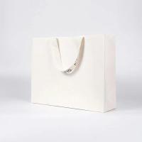 China White Varnishing Apparel Paper Bag 190gsm To 350gsm Jewelry Gift Pouches for sale