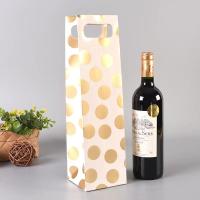 China 12.5x11x33.6CM Gold Printed Wine Bottle Paper Bags Customized for sale