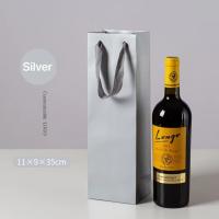 China 157gsm Insulated Washable Brown Paper Wine Bags Die Cut Handle for sale