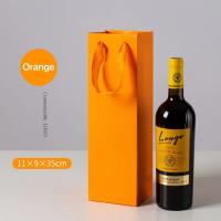 China 157gsm Insulated Washable Brown Paper Wine Bags Die Cut Handle for sale