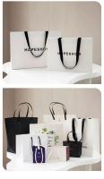 China ODM 180gsm To 250gsm Present Paper Bags Clothing Wedding Favor Bags With Handles for sale