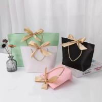 China Stamping Logo Light Green Cosmetic Shopping Bag Bow Tie Ribbon White Gift Bag for sale