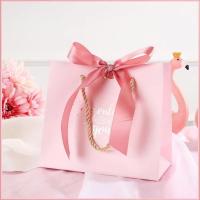 China Apparel Smoky Printed Paper Shopping Bags C2S Artpaper Ribbon Handle Gift Bags for sale