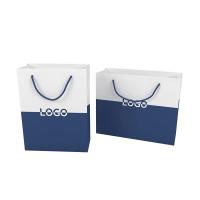 China 128gsm-350gsm Art Paper Shopping Bag Simple Strokes Printing Brown Paper Grocery Bags for sale