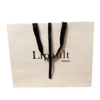 China 175gsm Lotus Color Goose Yellow Garment Paper Bags For Clothing Store for sale