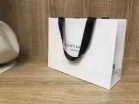 China 175gsm Lotus Color Goose Yellow Garment Paper Bags For Clothing Store for sale