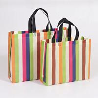 China Logo Printed Gilding Striped Apparel Paper Bag Packaging For Clothes for sale