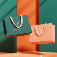 China ODM Grapefruit Color Paper Garment Bags Custom Printed Paper Take Out Bags for sale