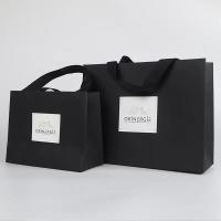 China OEM Black White Apparel Paper Bag Clothing Marble Paper Gift Bags for sale