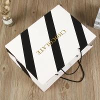 China 128-250gram Black Handle Laminated Art Paper Bag For Apparel Advertising for sale