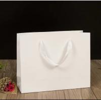China Customized Logo 180gsm-500gsm Boutique Paper Bag With Handles for sale
