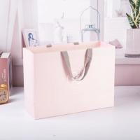 China 28.5*8*40cm Pink Paper Bags Custom Logo for sale