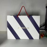 China Ribbon Handle Apparel Paper Bag for sale