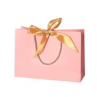 China Ribbon Handle Cosmetic Paper Bags for sale