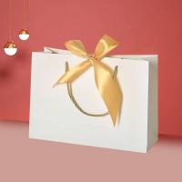 China Ribbon Handle Cosmetic Paper Bags for sale