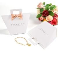 China Custom Logo White Kraft Present Paper Bags 9.5*9*12cm French Gift Bag With Ribbon for sale