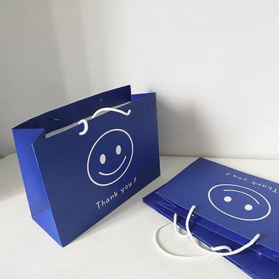 China 35*26cm Printed Paper Shopping Bags for sale
