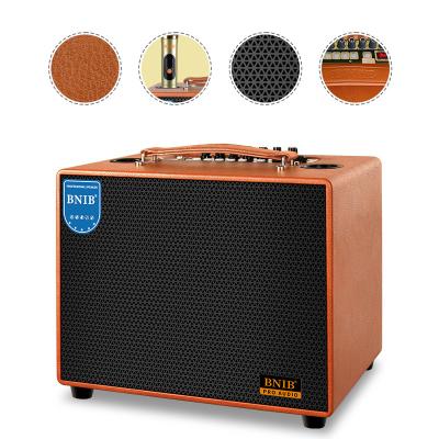 China 60W 12V 4.5Ah Wooden Bass Portable Bluetooth Speaker With Leather Strap for sale