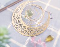 China Nordic Style Metal Wind Spinner Moon Design Rotating Metal Wind Chimes for sale