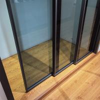 China Sliding Tempered Glass Door with Water-Resistant Design for High-End Apartments and Upscale Hotel Suites for sale