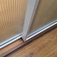 China Modern Minimalist Style Tempered Pattern Glass Door with Clean Sliding Design for sale