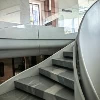 China Ingenious Selection: Curved Tempered Glass Empowers Staircase Spaces, Dual Advancement of Safety and Aesthetics for sale