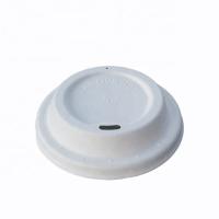 China PFAS Free Biodegradable Molded Sugarcane Bagasse Disposable Coffee Cup Lids for sale