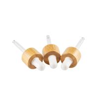 China Essence Oil Bottle Cosmetics Bottle Bamboo Dropper Tops 0.25ml 0.5ml for sale