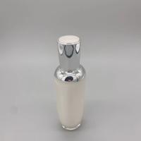 China Regenerist Skin Toner Bottle Acrylic Oval Cylinder Plastic PS Bottle for sale