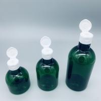 China Dark Green Empty Wholesale 50ml 100ml 150ml Round Custom Shampoo Bottle PET Cosmetic Plastic Pump Bottle for sale