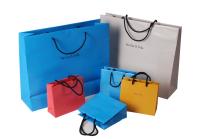 China Custom Eco-Friendly Paper Bags with Logo Printing - 80-300gsm Material Options, 3M Monthly Capacity for sale