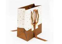 China Custom Luxury Paper Bags with Glossy Lamination - 1000 MOQ, 3M Monthly Capacity, 80-300gsm Material Options for sale