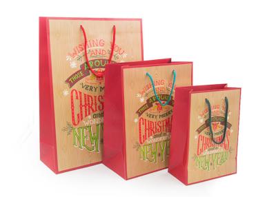 China Custom 350gsm Coated Paper Luxury Christmas Gift Bags with Eco-Friendly Materials - 3,000 MOQ & 3M Monthly Capacity for sale