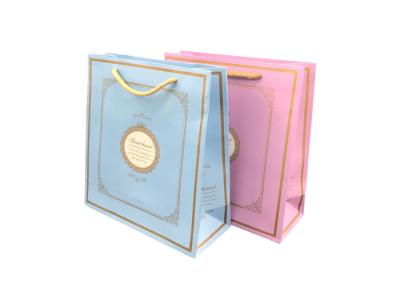 China Custom Paper Gift Bags 157-350g Material with Multiple Handle Options - 3,000pcs MOQ for sale