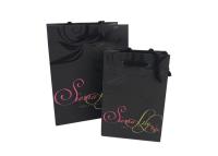 China High - End Recycled Present Paper Bag / Large Black Gift Bags Spot UV Logo for sale