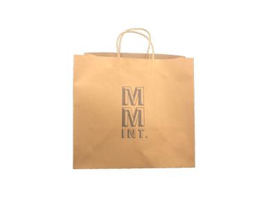 China Kraft Custom Printed Paper Shopping Bags with Silver Foil Stamping 80g-350g Material Range OEM Service for sale