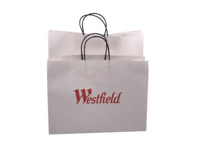 China Custom Biodegradable Kraft Paper Bags 80g-350g for Eco-Friendly Takeaway Food Packaging with Black Handle Options for sale