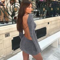 China Fashion Slim Knitted Dress Sexy Backless Woolen Long Sleeved Hip Wrap Dress for sale