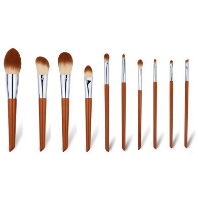 China 10-Piece Orange Aluminum Ferrule Makeup Brush Set with Soft Synthetic Bristles for sale