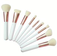 China 9 Piece Synthetic Makeup Brush Set Beige Hair Soft Natural Finish White Wood Handle for sale