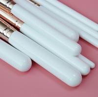 China 9 Piece Synthetic Makeup Brush Set Beige Hair Soft Natural Finish White Wood Handle for sale