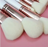 China 9 Piece Synthetic Makeup Brush Set Beige Hair Soft Natural Finish White Wood Handle for sale