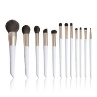 China Custom Logo White Luxury Makeup Brush Set 12Pcs Super Dense Powder Foundation Brush Synthetic Vegan Hair for sale