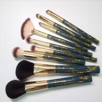 China Music Stave Patterned Oval Makeup Brush Set 9 Pieces Synthetic Hair Gold Ferrule for sale