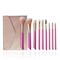 China 9 Piece Glitter Pink Makeup Brush Set with Synthetic Hair and Wooden Handle for sale